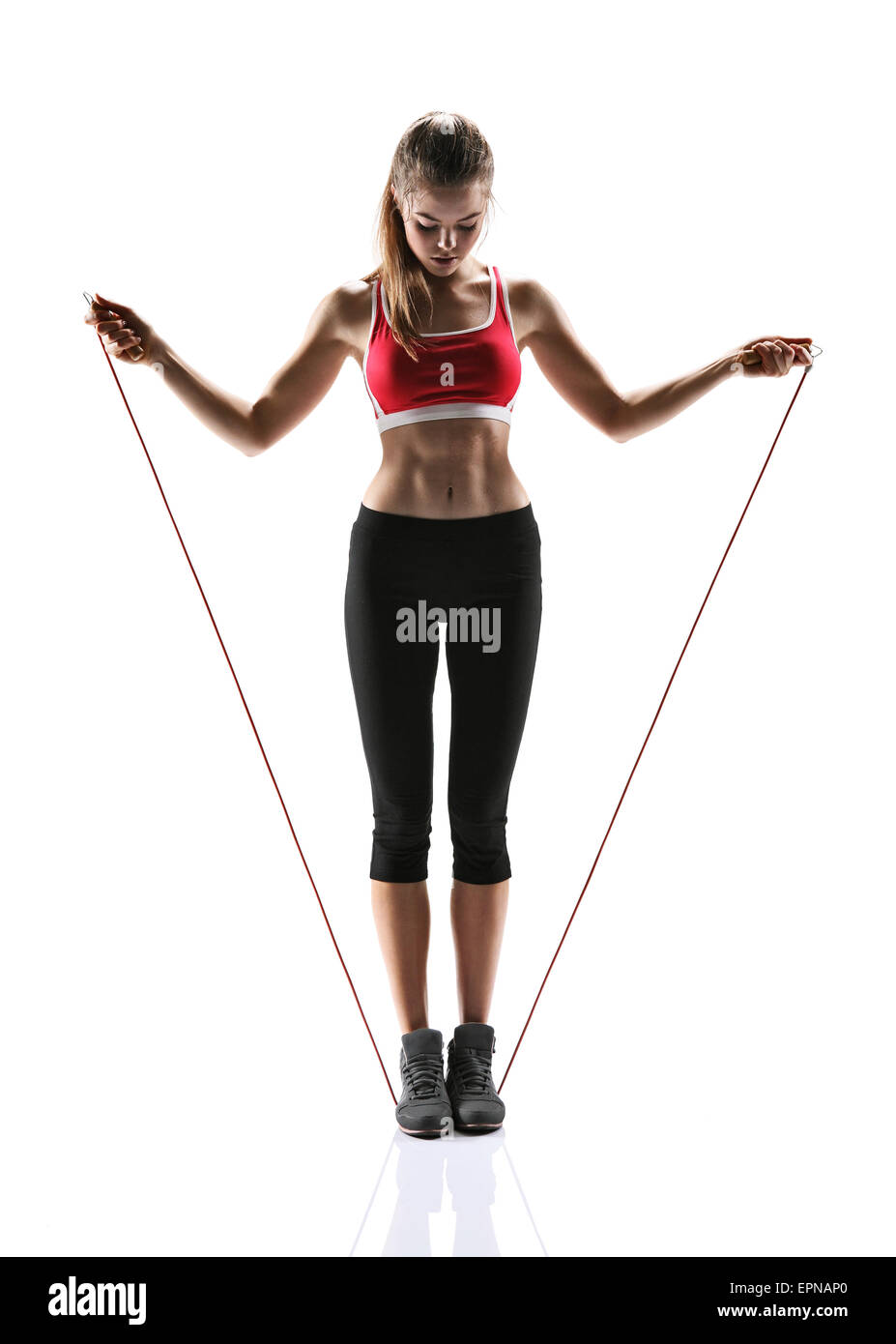 Young woman doing exercise with a skipping rope / photo set of sporty ...