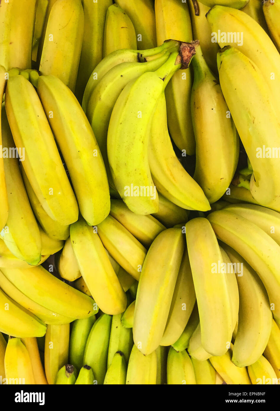 Fresh bananas background Stock Photo - Alamy