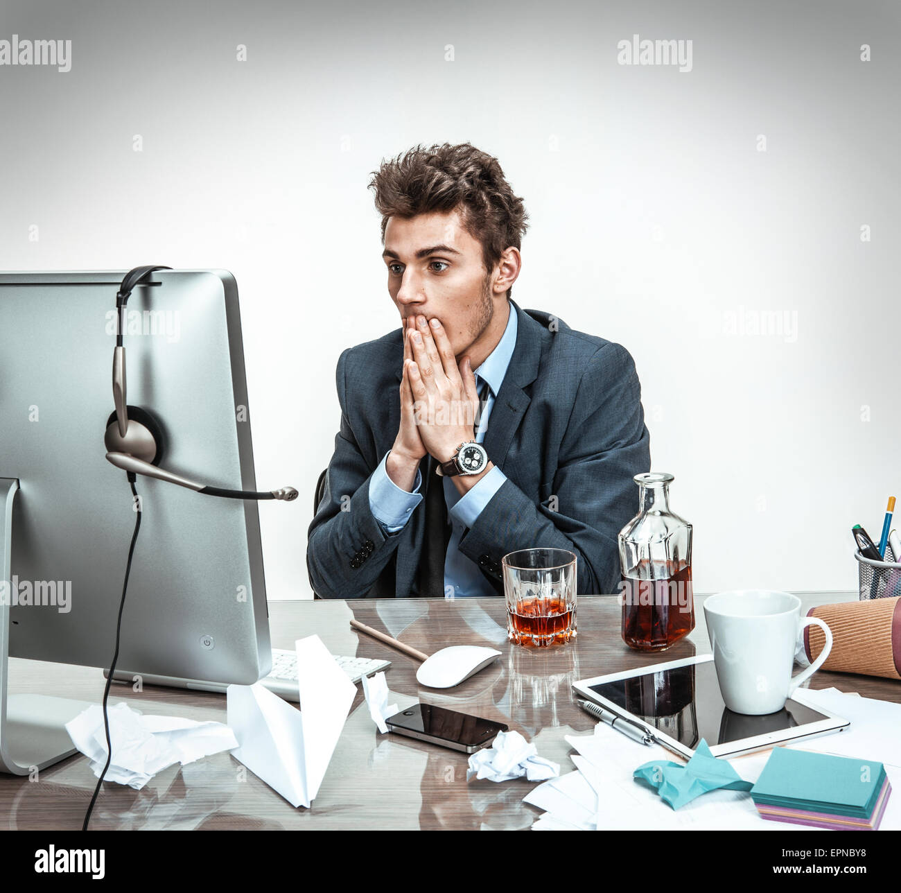 Man shocked looking what happened with his computer / modern office man ...