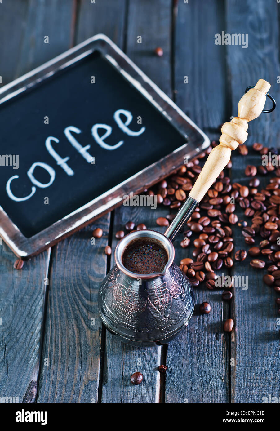 coffee beans on the wooden table, coffee background Stock Photo - Alamy
