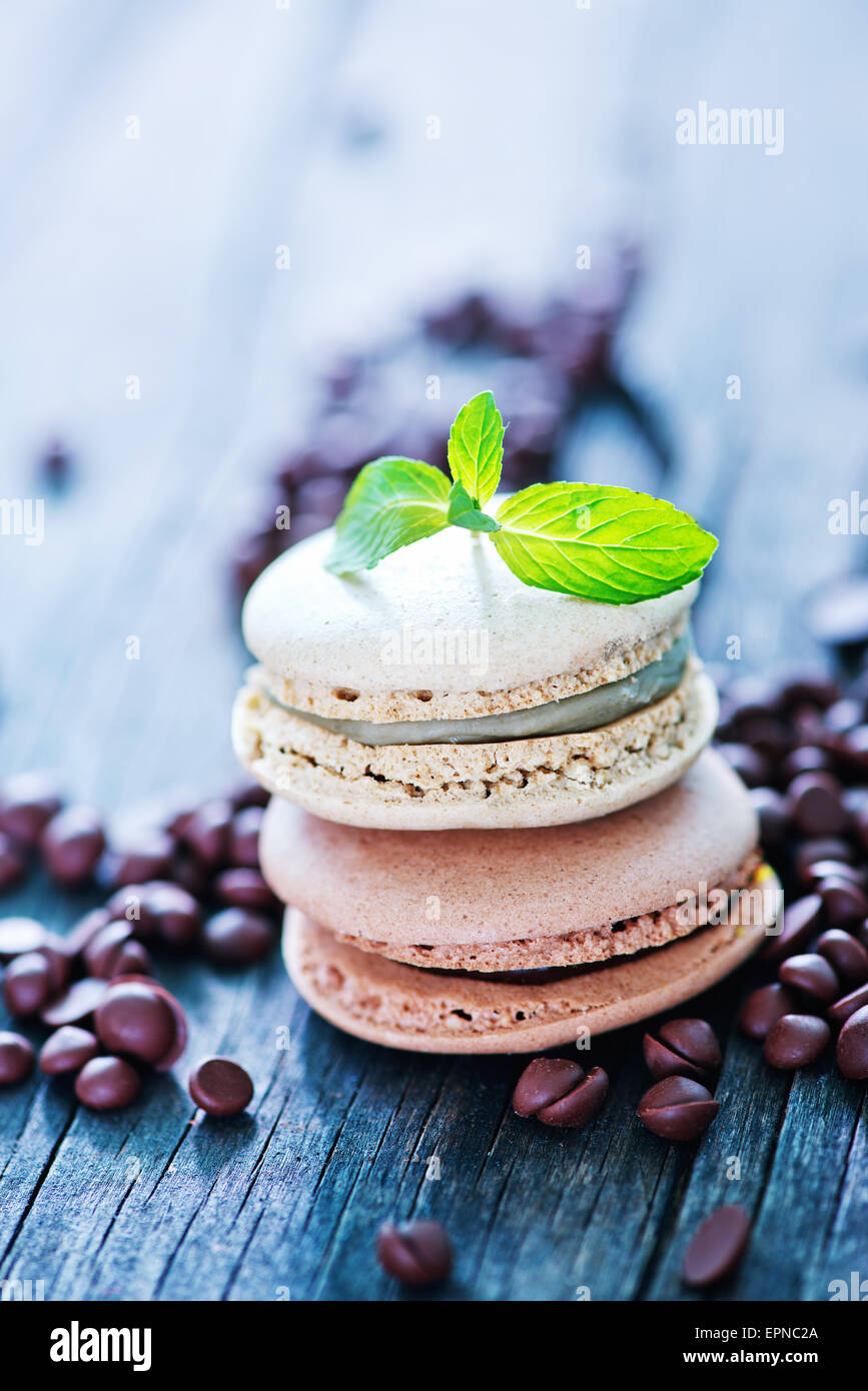 chocolate macaroons and mint leaf on a table Stock Photo - Alamy
