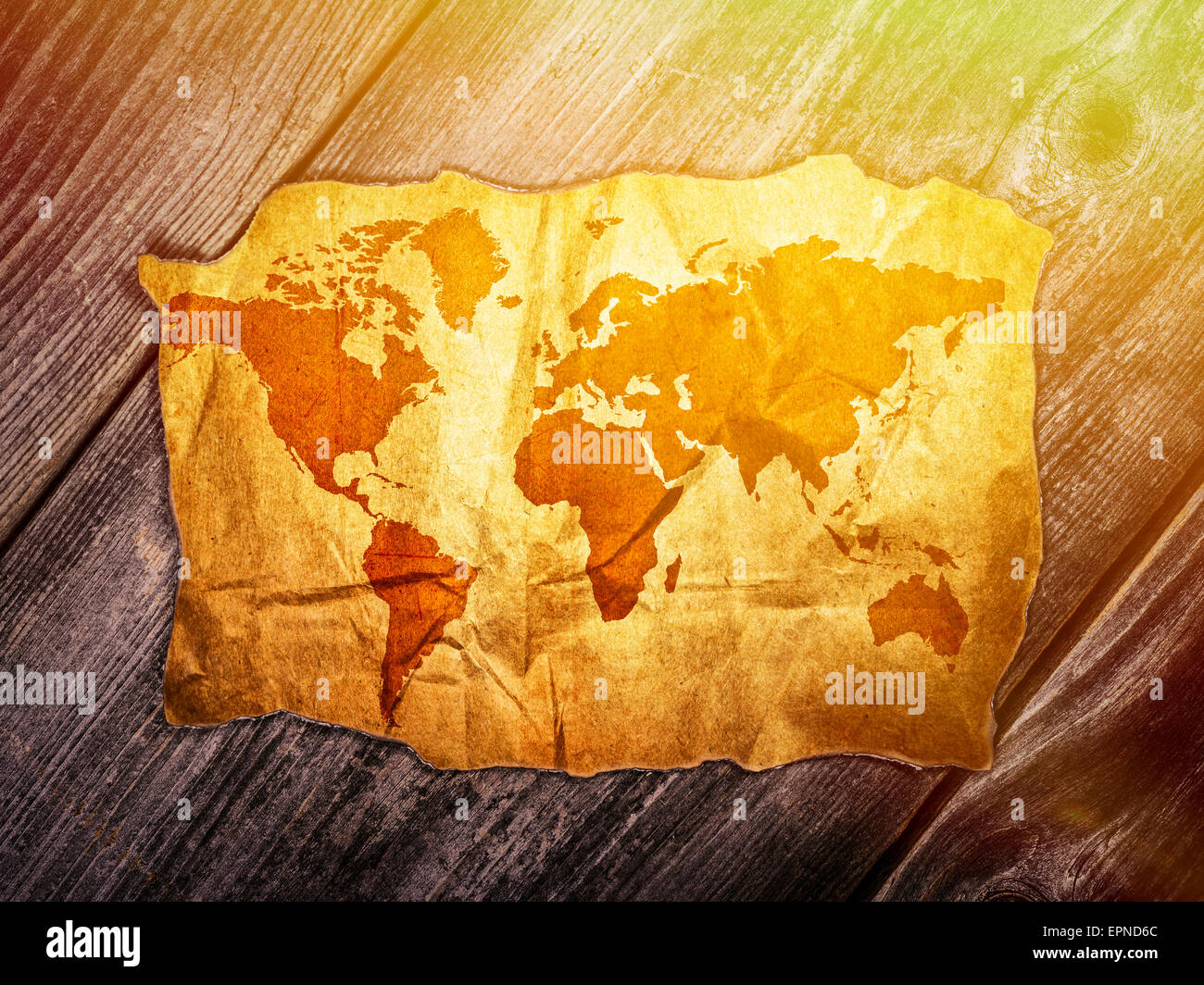 Old world map over wooden background Stock Photo - Alamy