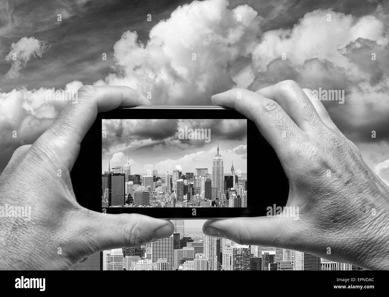 Man and woman hand capturing New York City skyline with smartphone ...