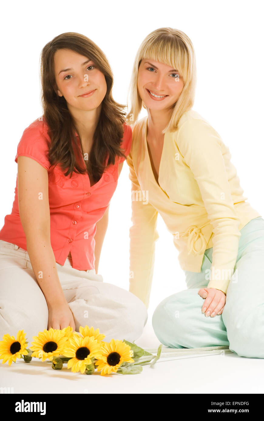 Two beautiful girls isolated on white background Stock Photo - Alamy