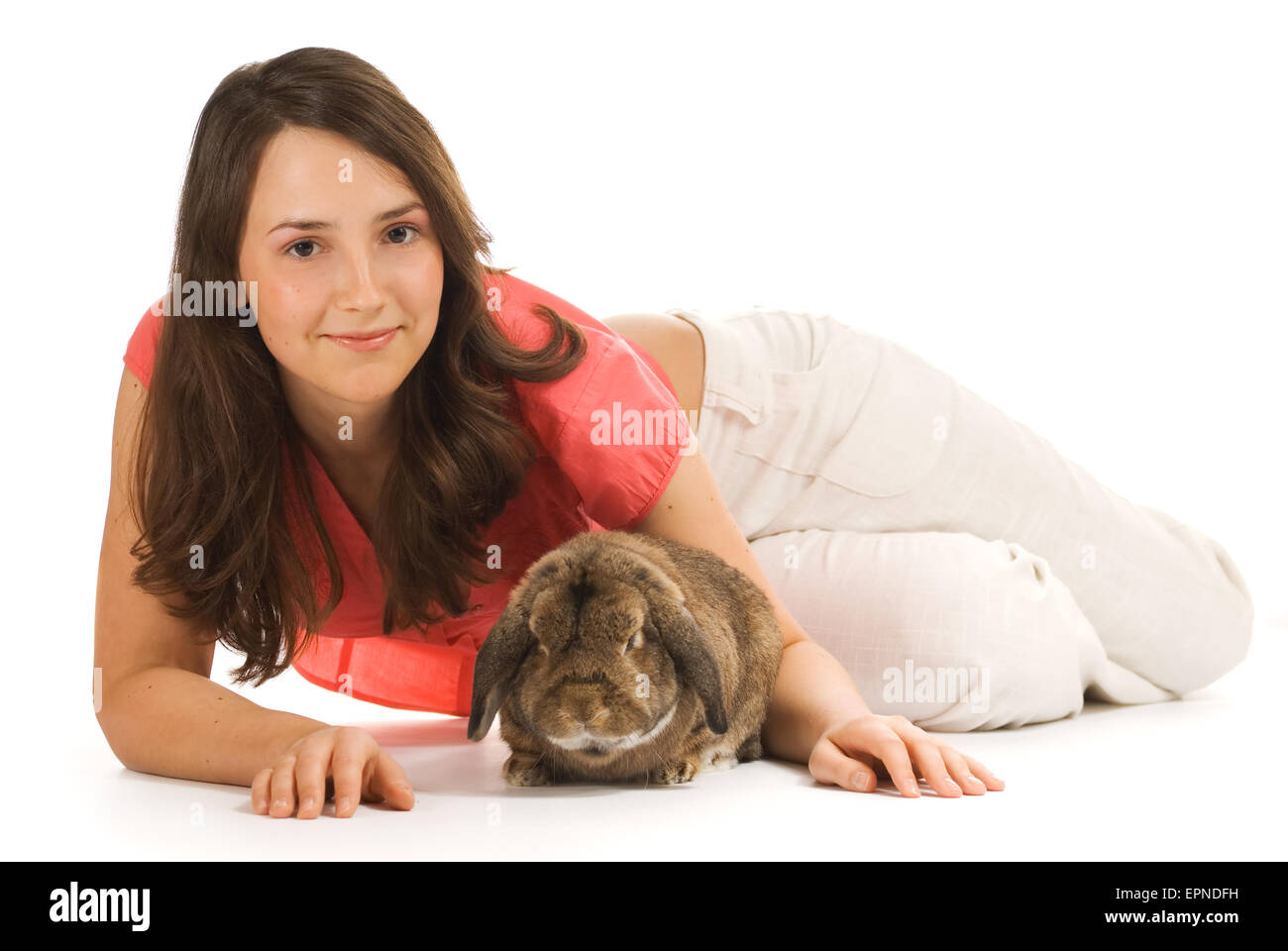 Beautiful brunette girl with rabbit isolated on white background Stock ...