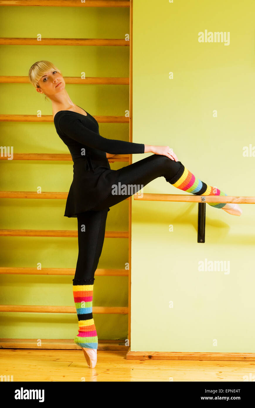 Ballet dancer doing exercise near the bar Stock Photo - Alamy