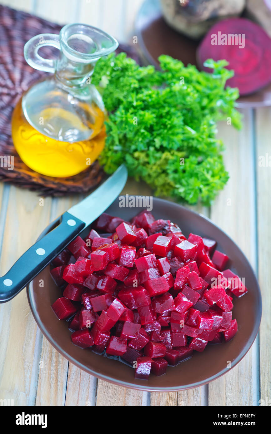 beet salad on plate and on a table Stock Photo - Alamy
