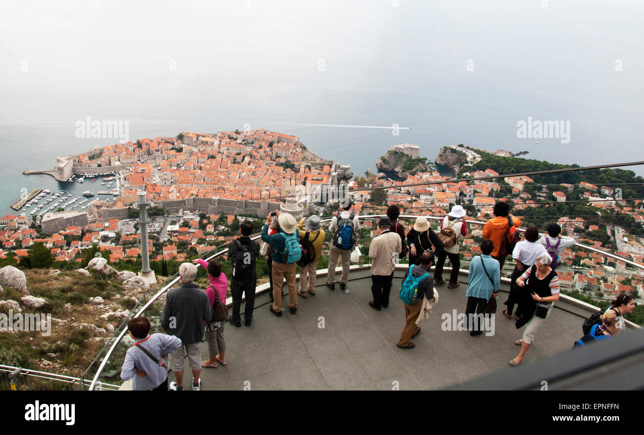 CROATIA; DUBROVNIK; JAPANESE TOURISTS ON CABLE CAR PLATFORM VIEWING OLD ...