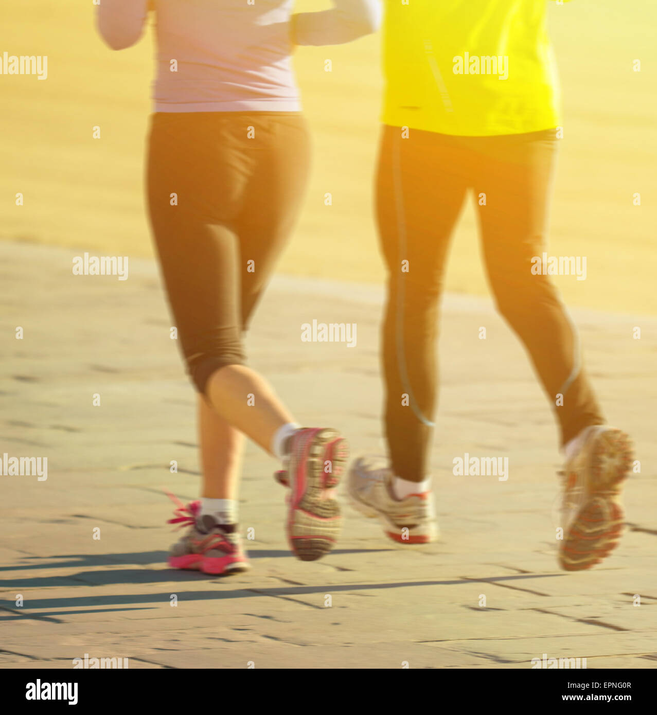 People running with motion blur effect Stock Photo - Alamy