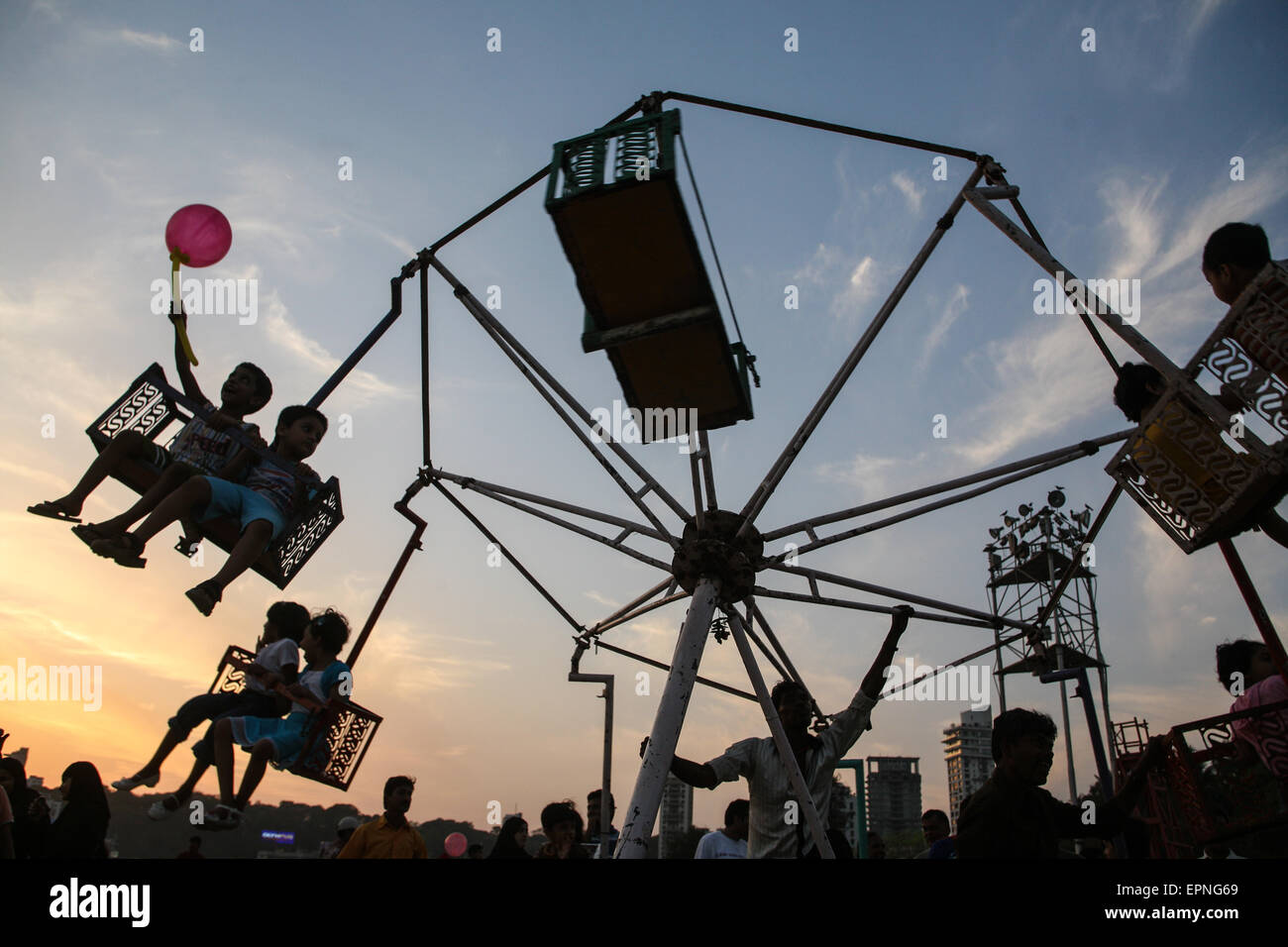 Silhouette Children On Fairground Ride High Resolution Stock ...