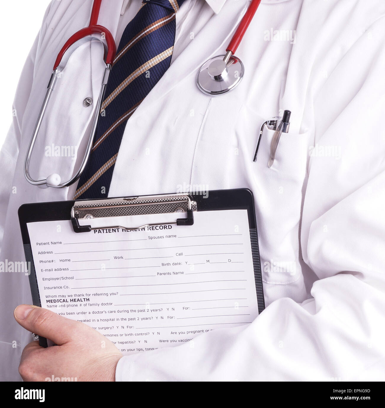 Male doctor fills patient registration form prior to admission and ...