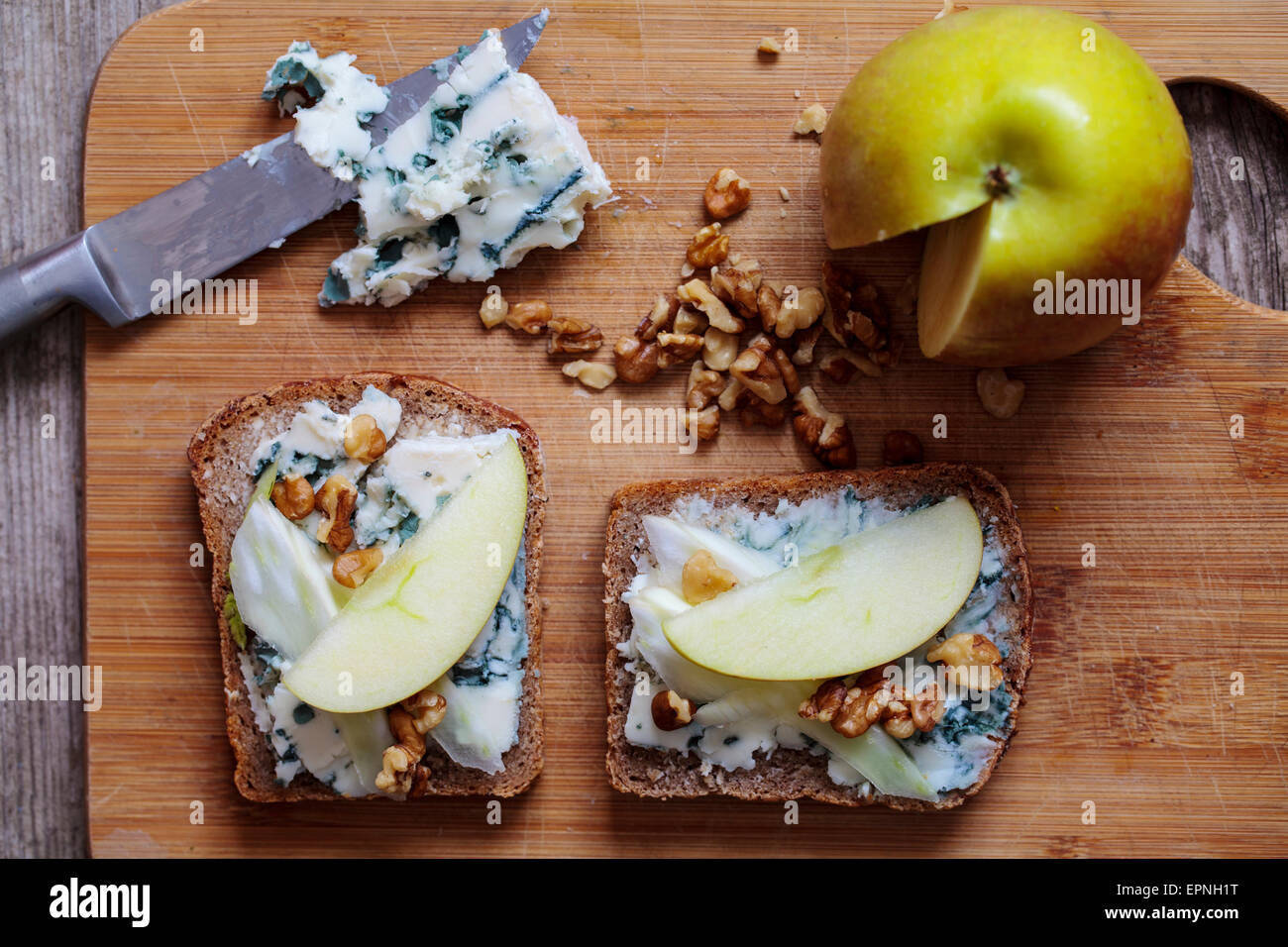 Rye bread with blue cheese, apple and walnut Stock Photo - Alamy