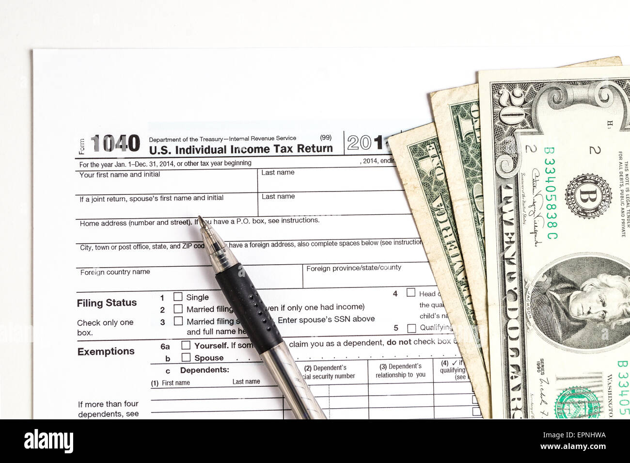 Tax form and Money. Filling the forms and hoping for a tax refund ...