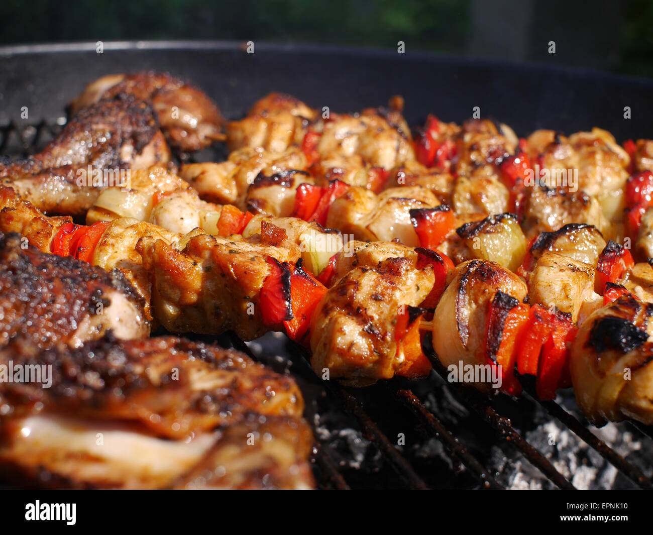 Cooking the meat on the barbecue hi-res stock photography and images ...