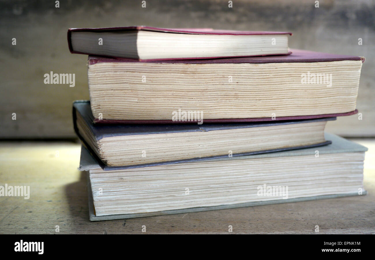 pile of old books in a classroom Stock Photo - Alamy