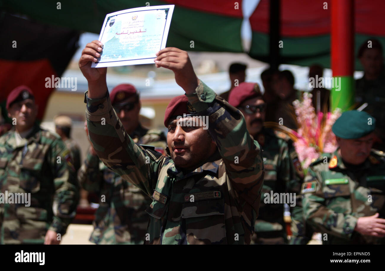 Kabul, Afghanistan. 20th May, 2015. An Afghan commando shows his ...