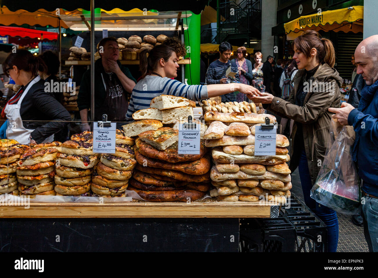 A Woman Buys Fresh Bread At Borough Market, London Bridge Area, London ...