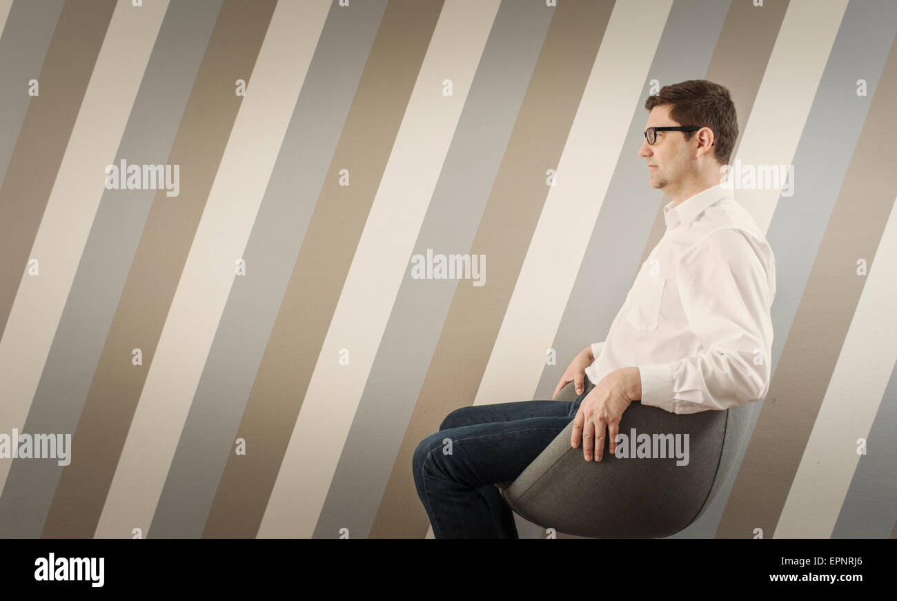 Portrait man on chair hi-res stock photography and images - Alamy