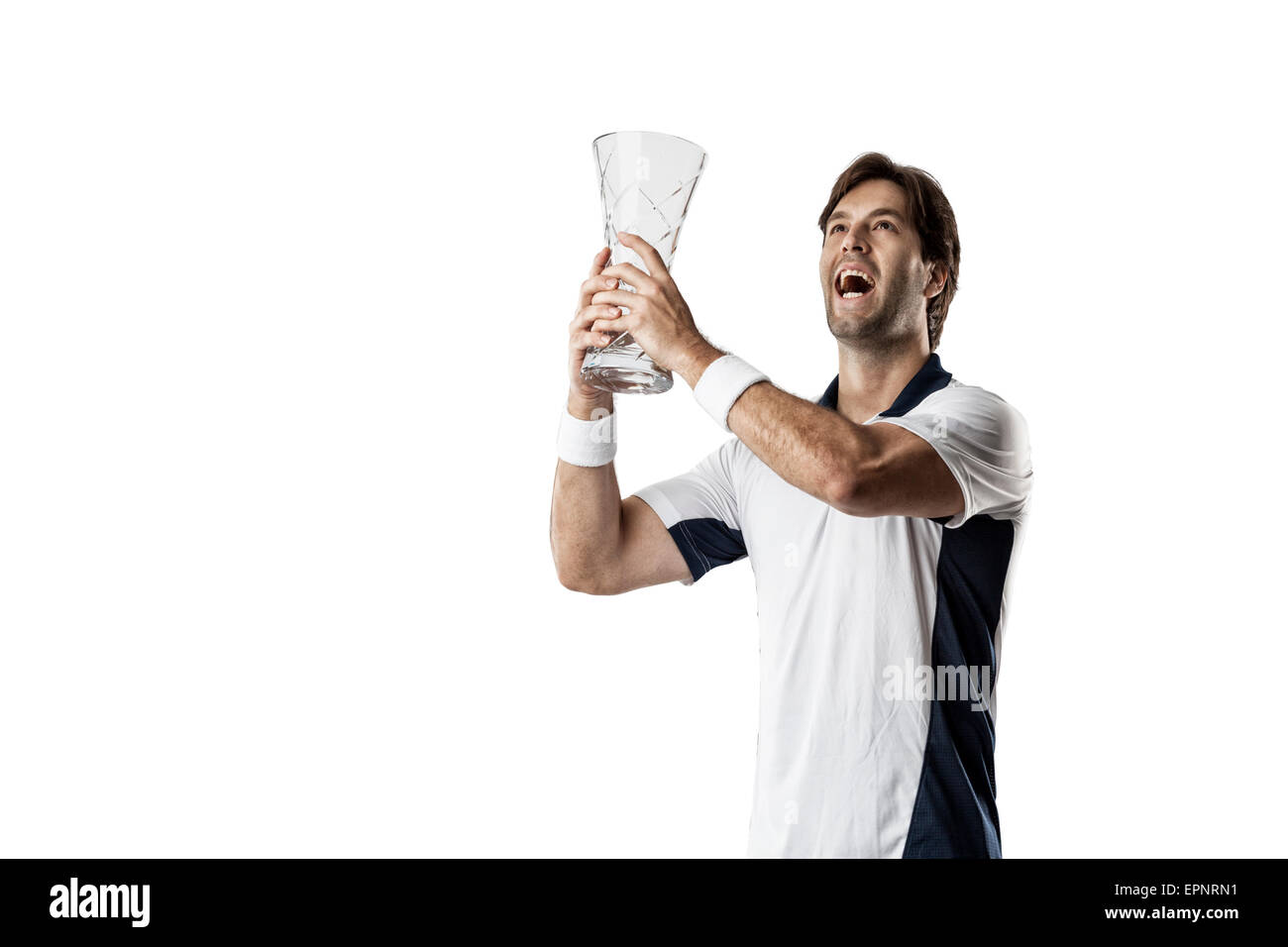 Tennis player celebrating with a glass trophy, on a white background ...