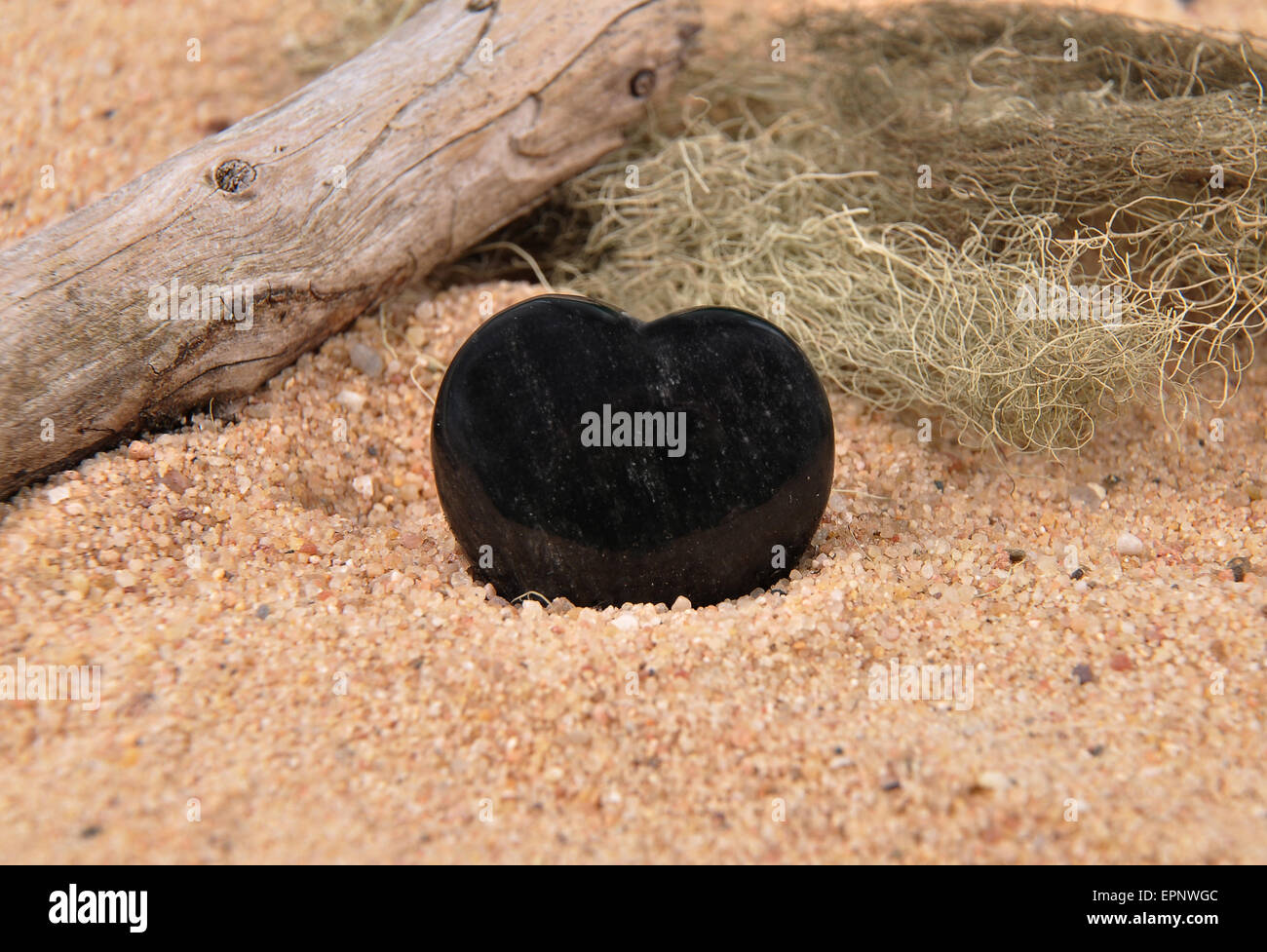 Obsidian on beach Stock Photo - Alamy
