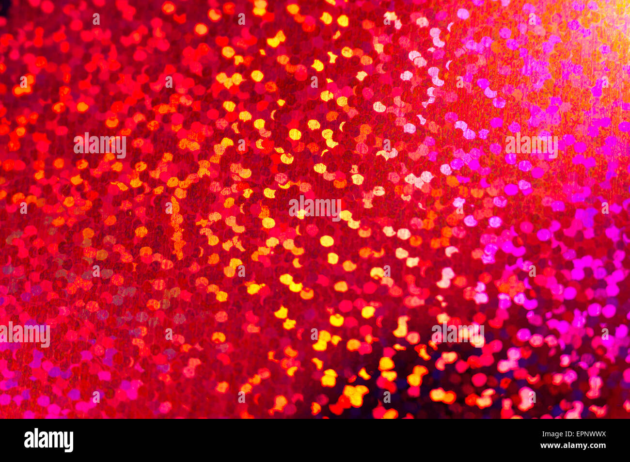 Holiday shiny blurry very bright red background. Macro Stock Photo - Alamy