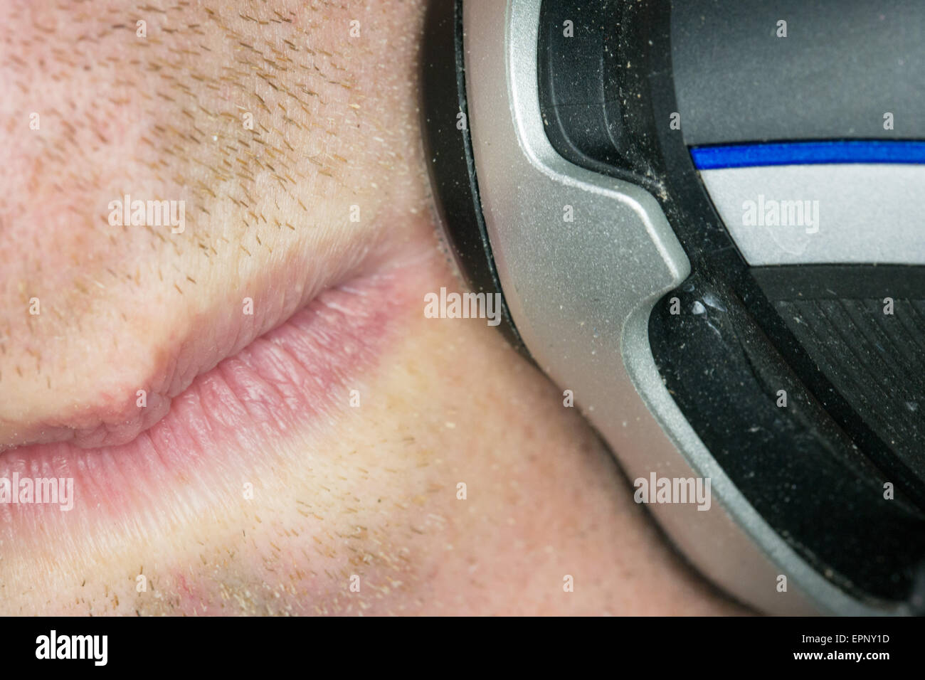 man using electric shaver Stock Photo - Alamy