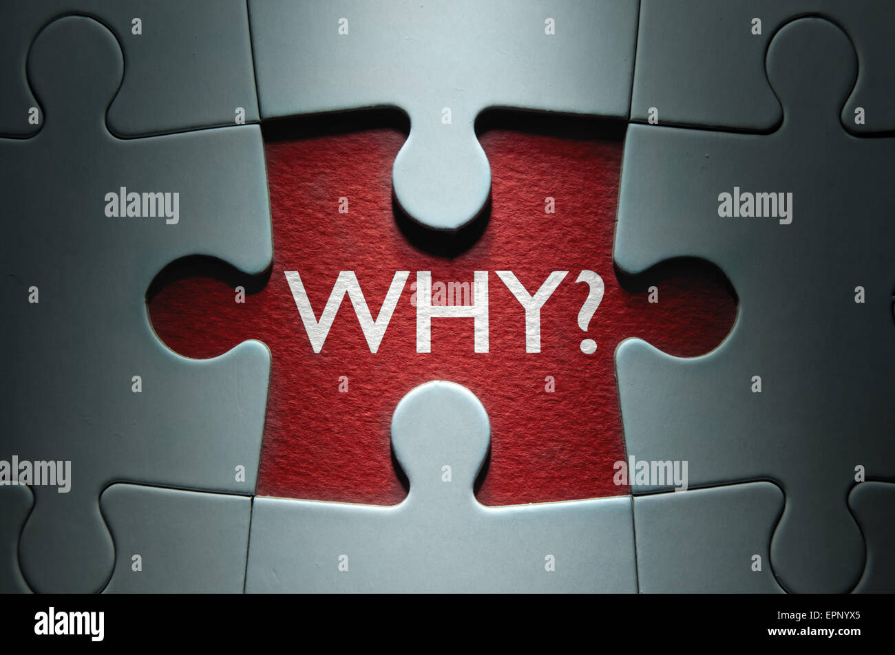 Missing piece from a jigsaw puzzle revealing the question why Stock ...