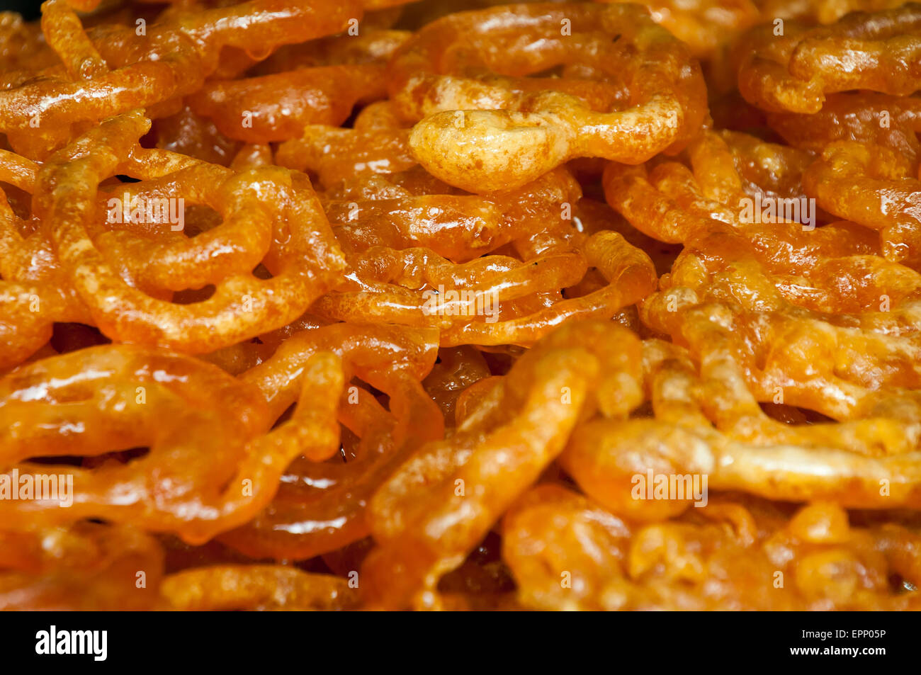 Indian popular sweets Jalebi on the street market Stock Photo - Alamy