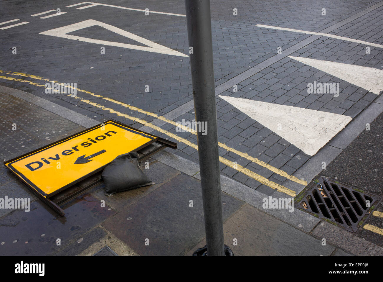 Aerial landscape of road diversion sign and road triangle markings ...