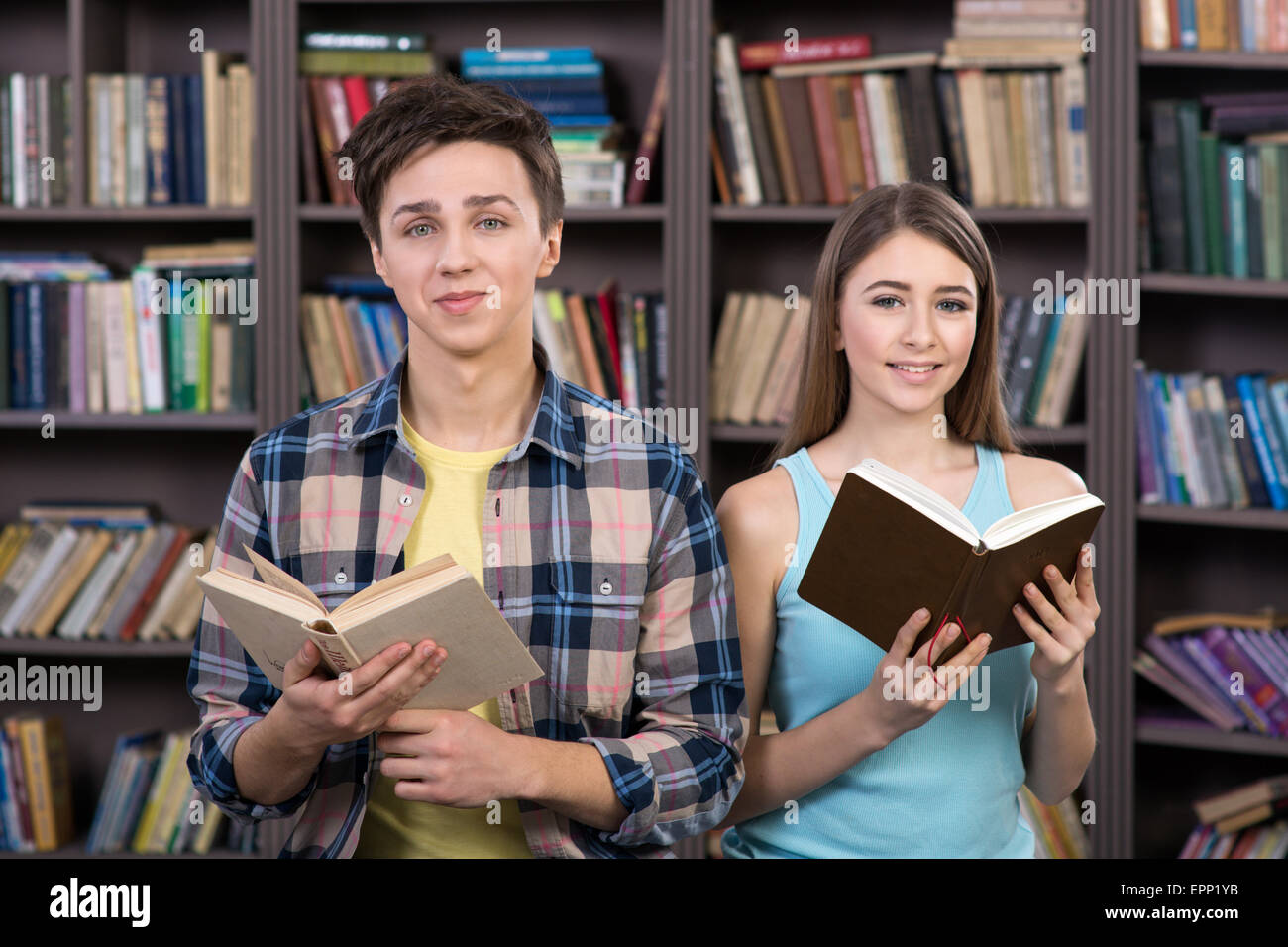 Concept for teenagers in library Stock Photo - Alamy