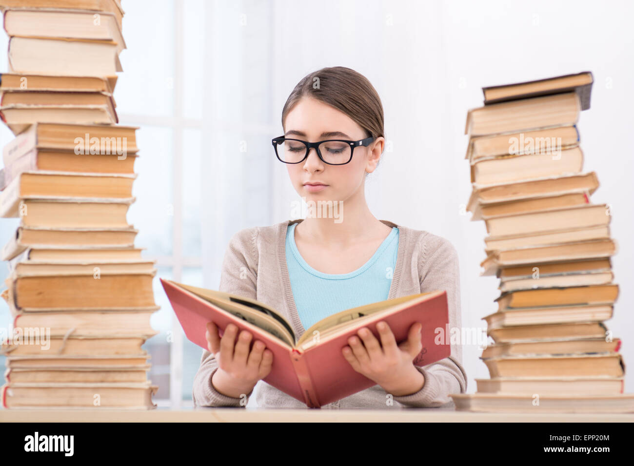 Concept for teenagers in library Stock Photo - Alamy