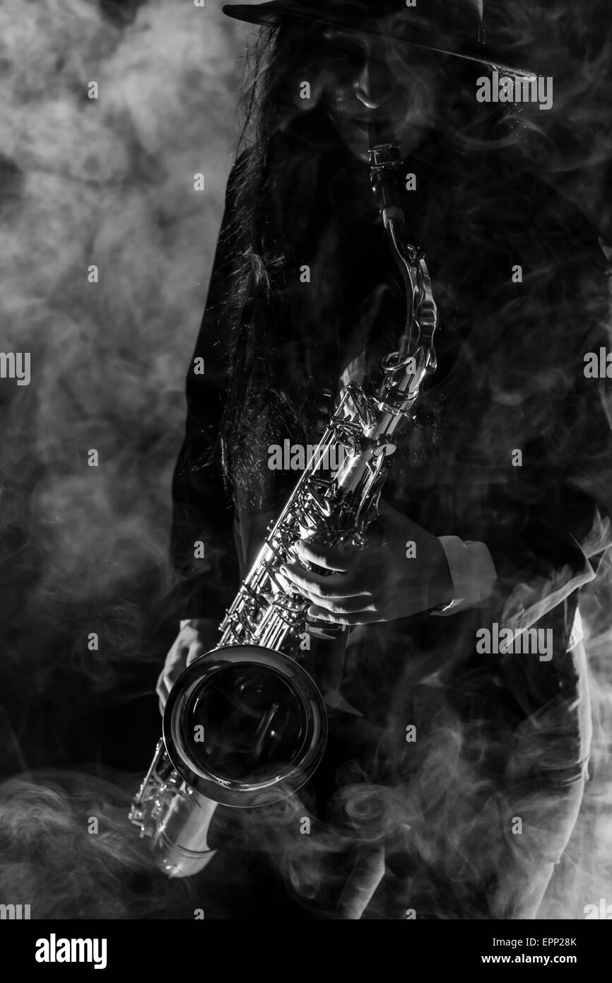 Sax lady hi-res stock photography and images - Alamy
