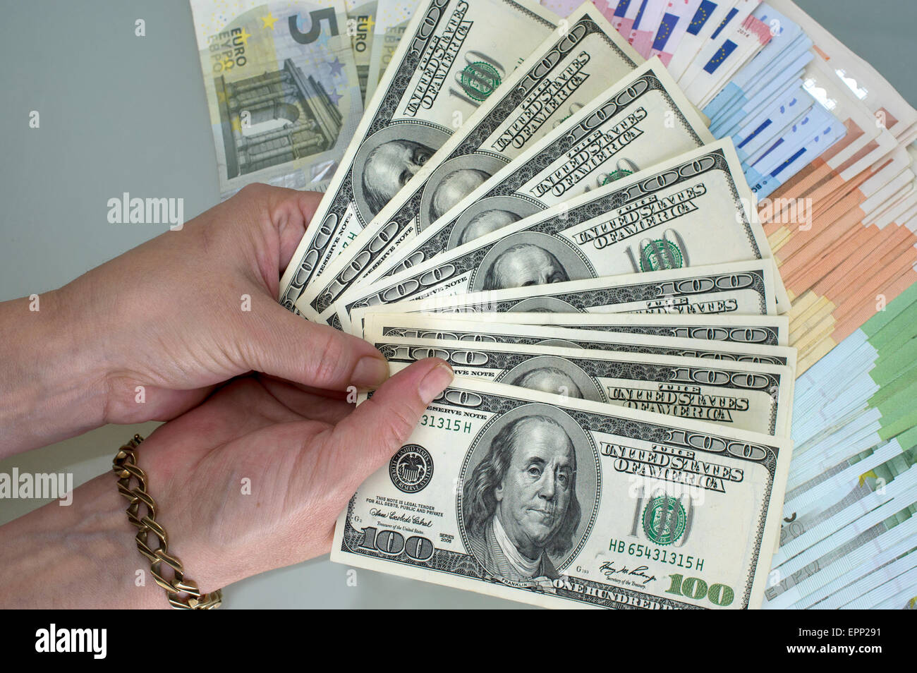 Female hands counting us dollars hi-res stock photography and images ...