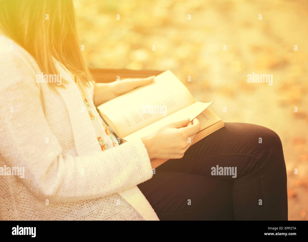 Girl reading book outdoor learning hi-res stock photography and images ...
