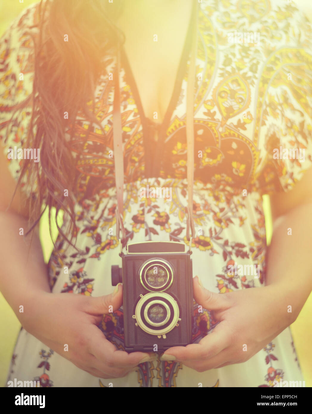 Retro image of woman hands holding vintage camera outdoors Stock Photo ...