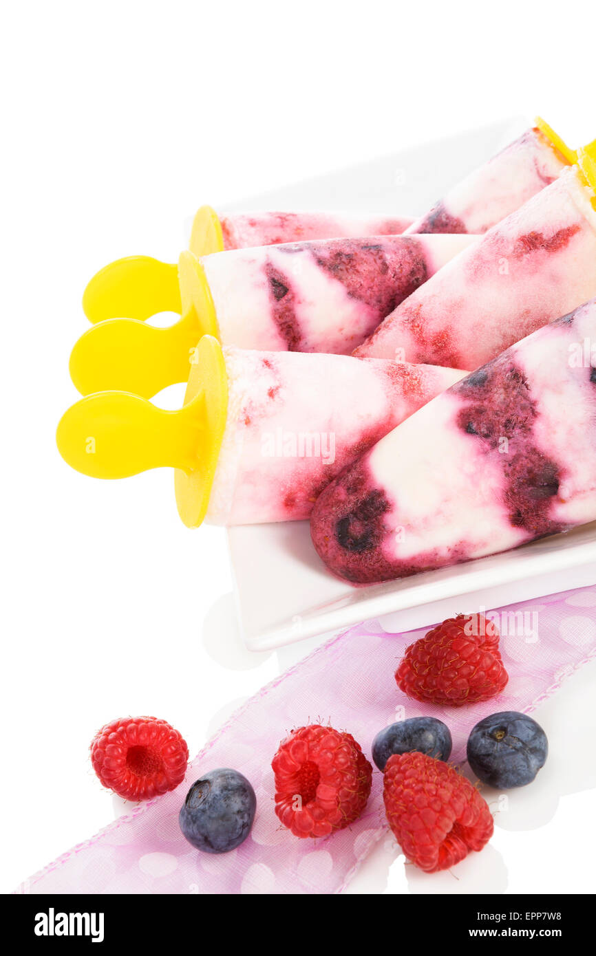 Ice lolly with fresh raspberries and mint leaves isolated on white ...