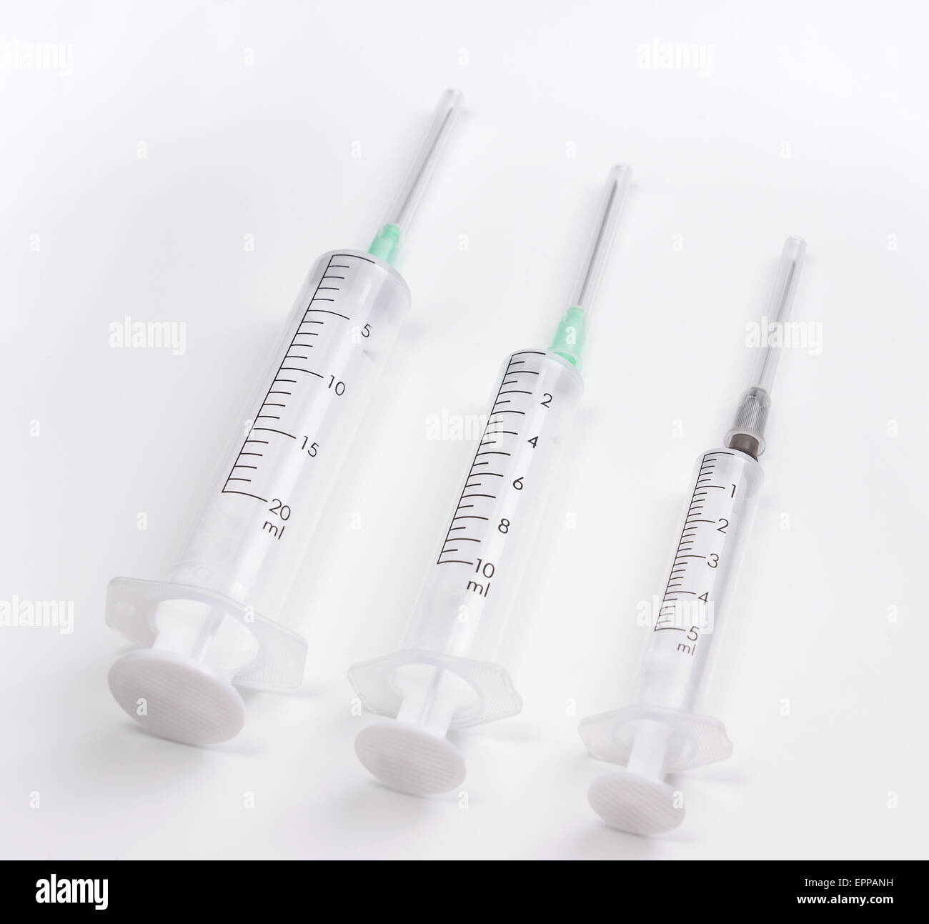medical syringes on a white background are used for injections of ...