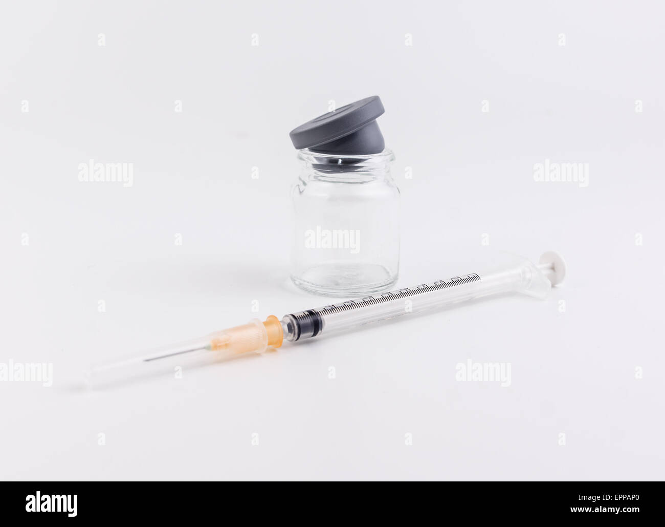 medical syringe and medicine liquid in a small bottle Stock Photo - Alamy