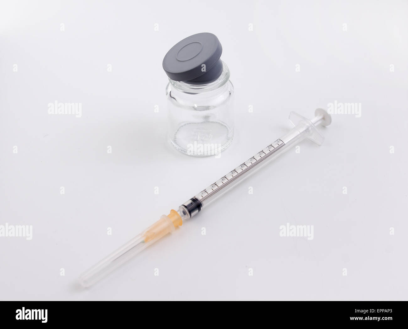 medical syringe and medicine liquid in a small bottle Stock Photo - Alamy