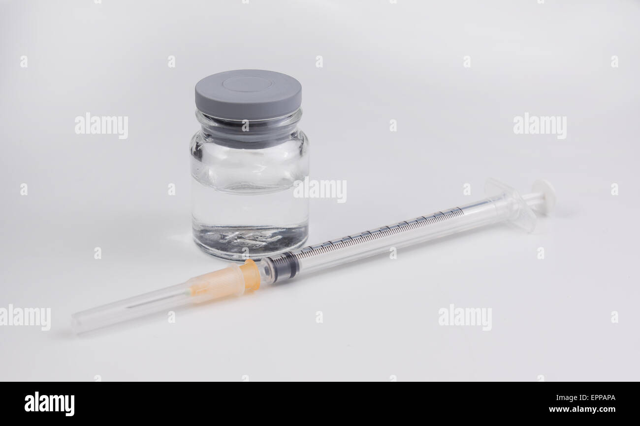 medical syringe and medicine liquid in a small bottle Stock Photo - Alamy