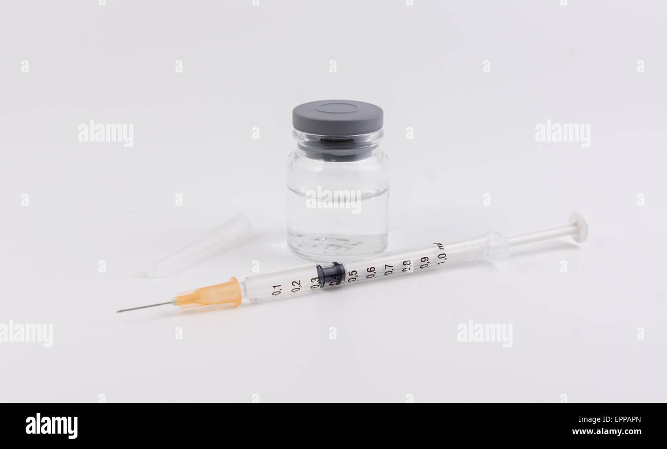 medical syringe and medicine liquid in a small bottle Stock Photo - Alamy