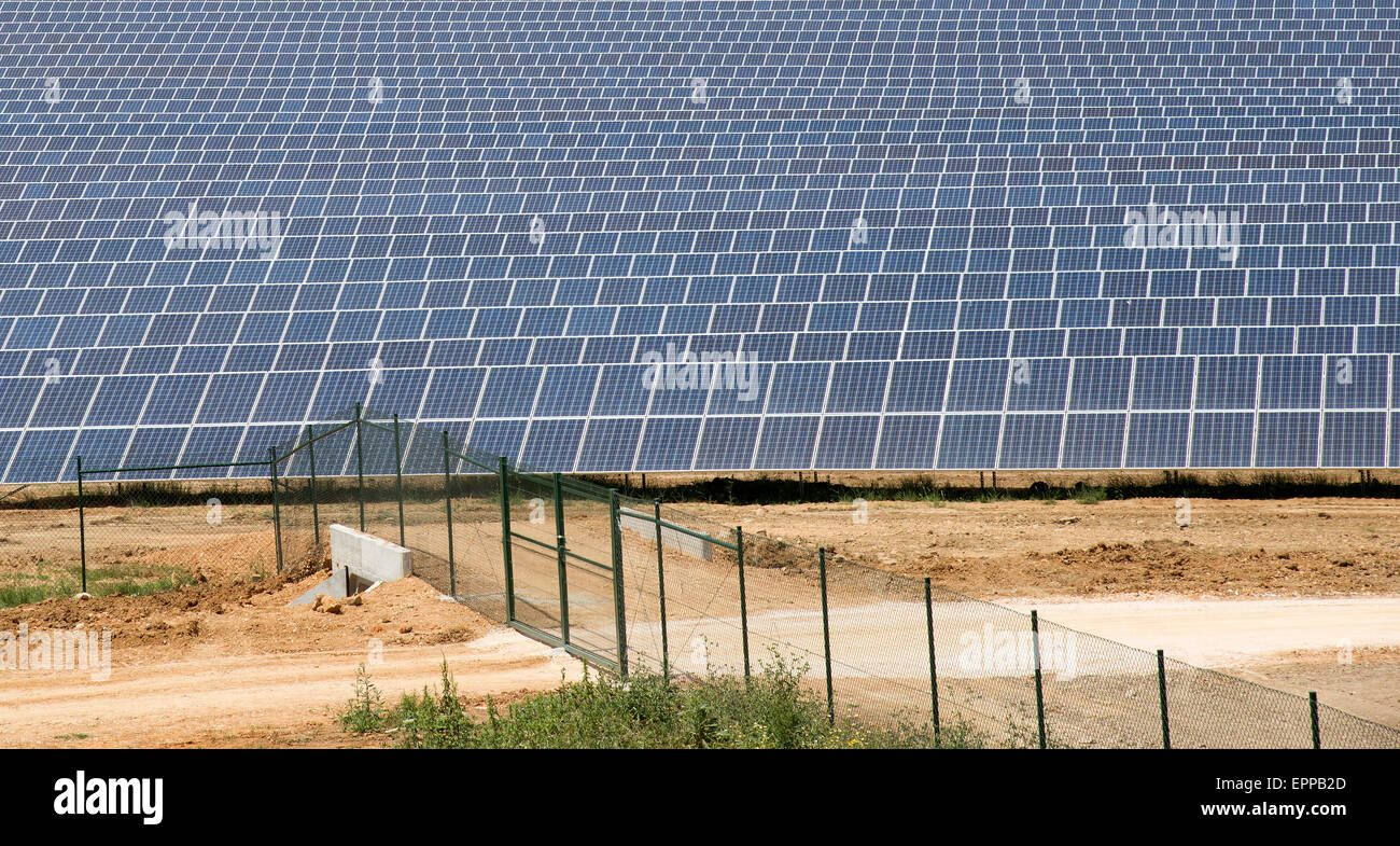 Commercial solar panels on agricultural land in a countryside area ...