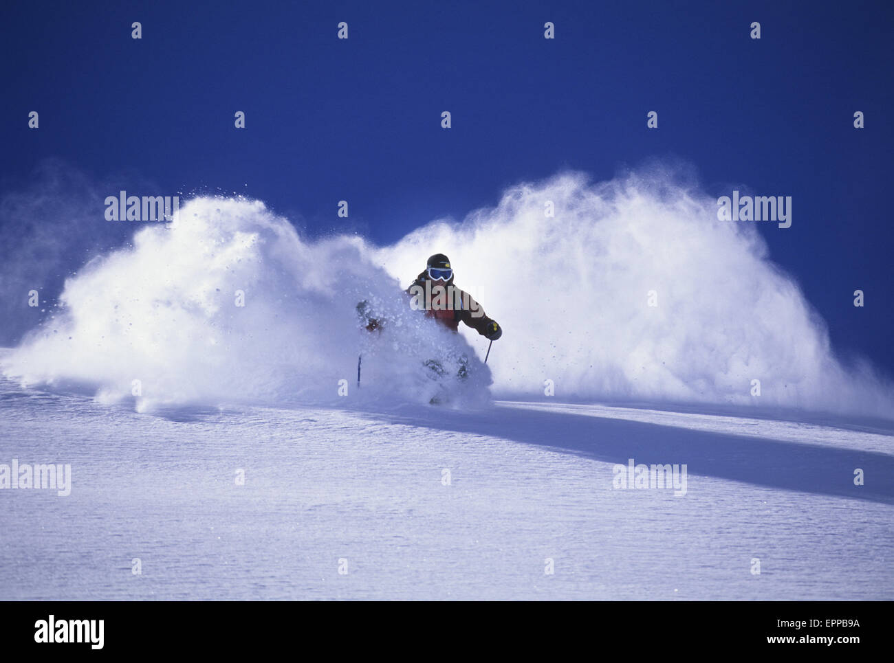 Man deep powder skiing hi-res stock photography and images - Alamy