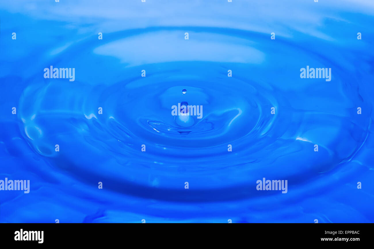 Water drops in blue color Stock Photo - Alamy