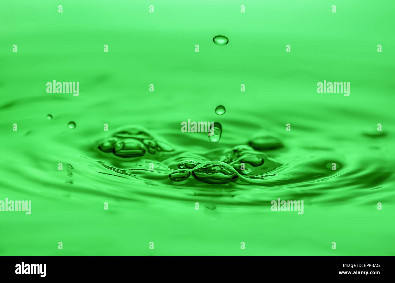 Water drops in green color Stock Photo - Alamy