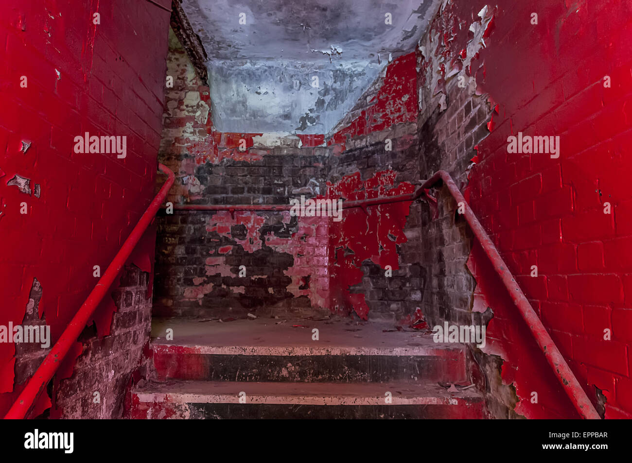 Destroyed staircase with emergency exit in an old building Stock Photo ...
