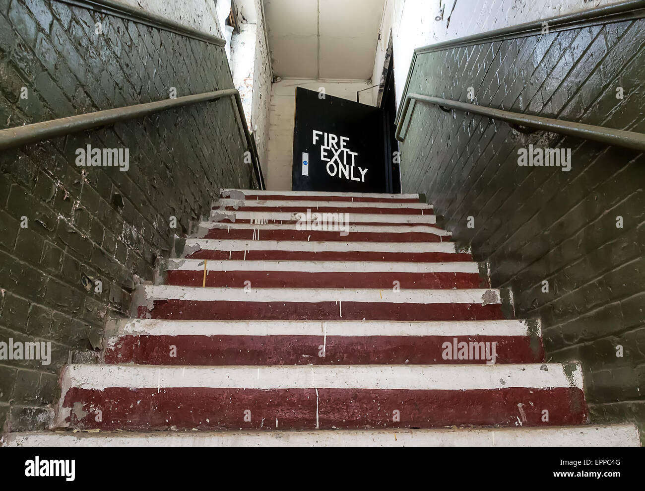 Old staircase with emergency fire exit in an old building Stock Photo ...