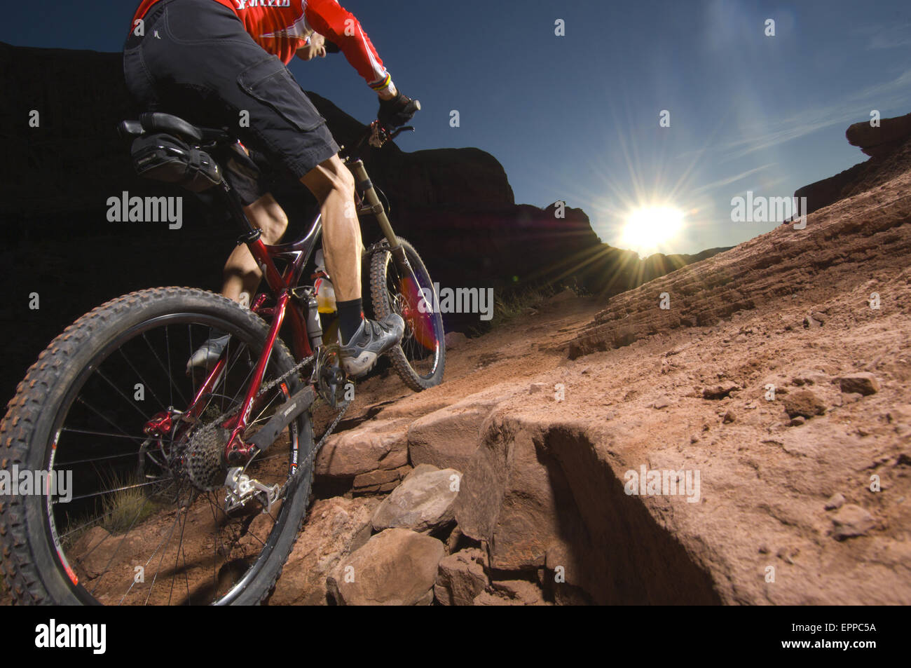 Man mountain biking on Porcupine Rim trail in Moab, Utah Stock Photo ...
