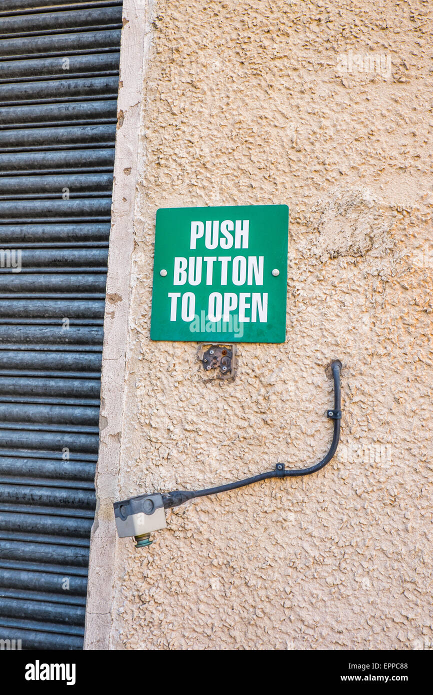 push the button wall sign- abandoned factory Stock Photo - Alamy