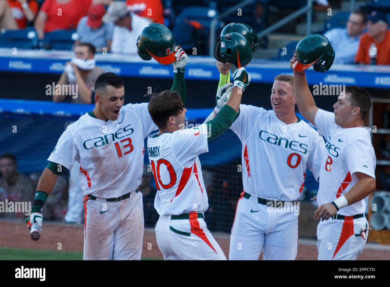 catcher Garrett Kennedy (40) of the Miami Hurricanes celebrates his 3 ...
